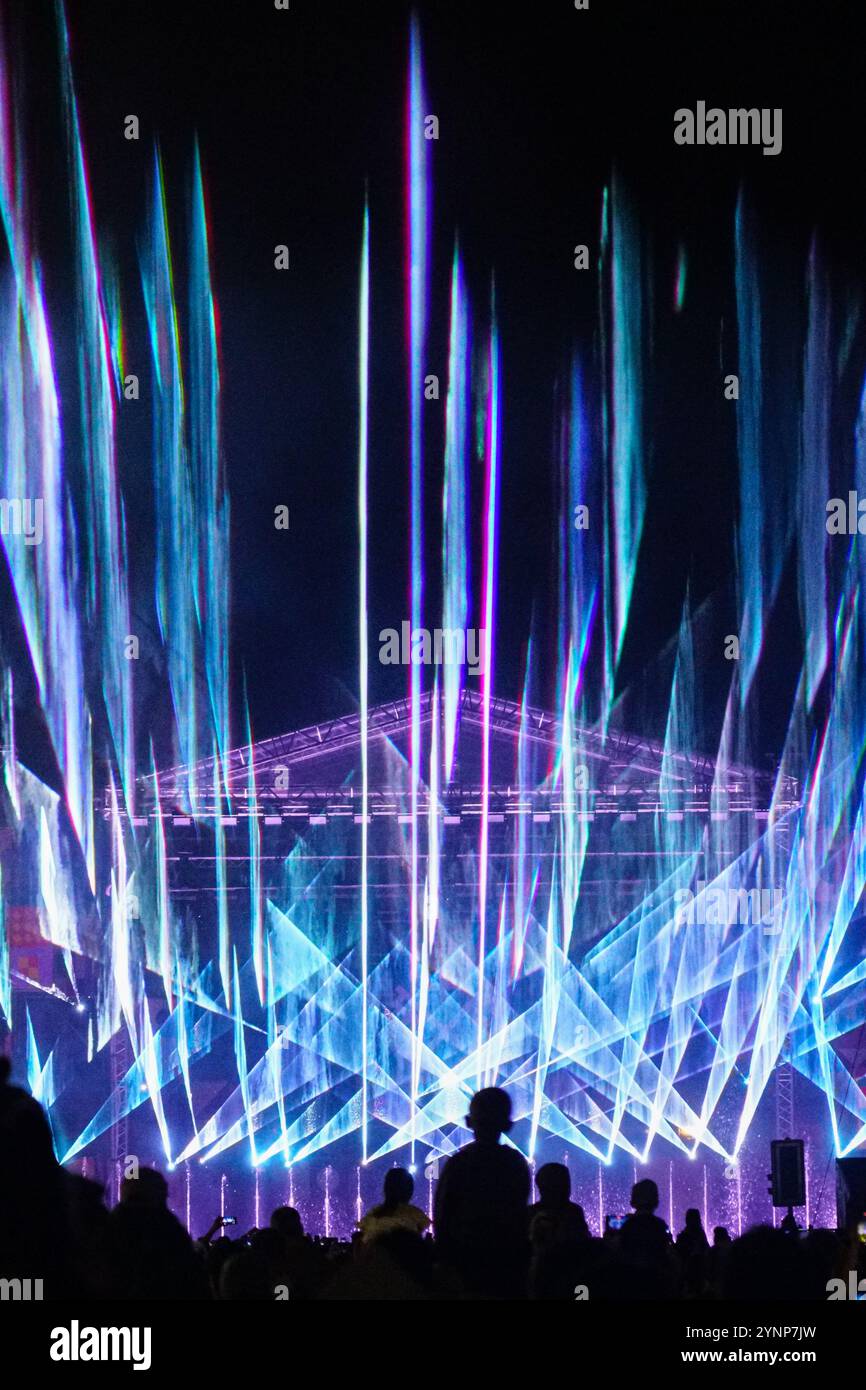 Spectacular bright open air laser show performance at the city festival ...