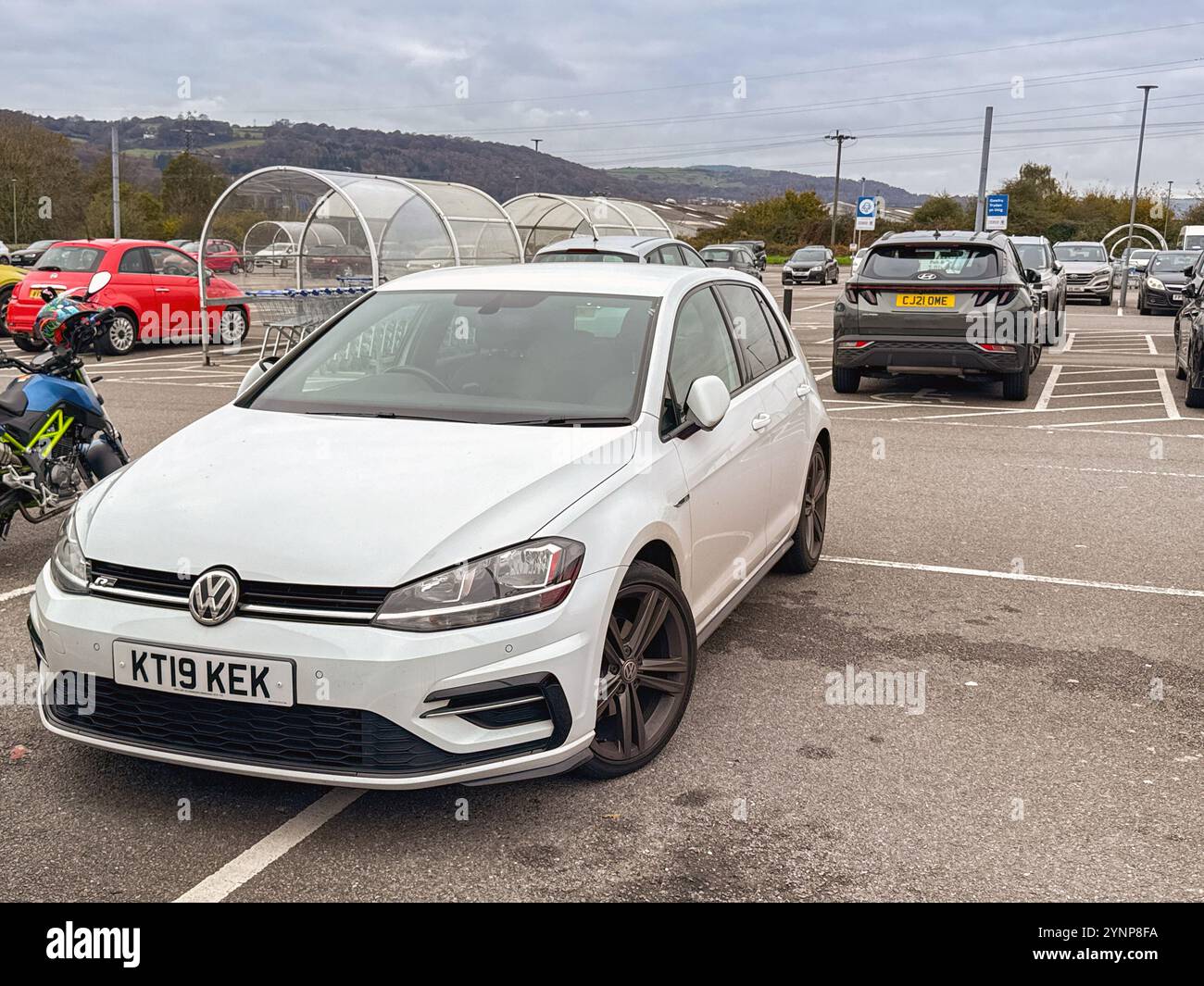 Pontypridd, Wales, UK - 10 January 2024: Car parked across two parking ...
