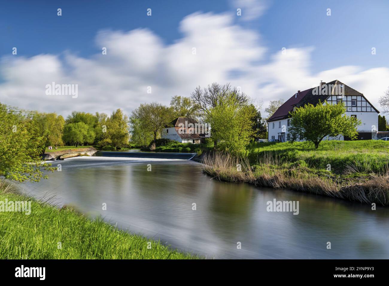 A view of a weir on the Unstrut a river in Germany Stock Photo - Alamy