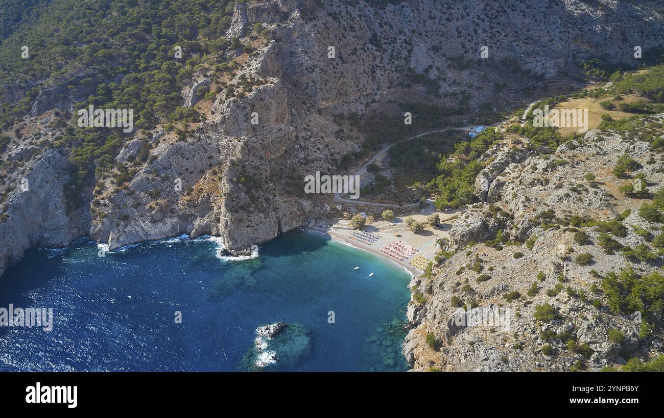 Drone shot, aerial view of a secluded bay with turquoise-coloured water ...
