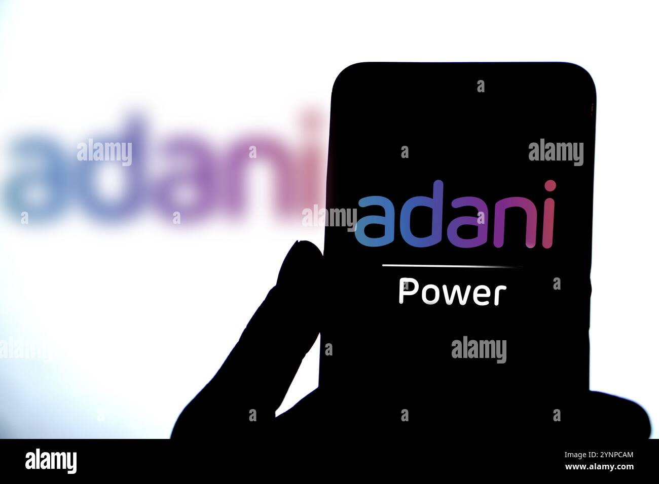Adani Green Energy Limited on screen in front of business logo Stock ...
