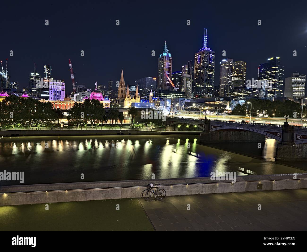 The skyline of Melbourne and Princes Bridge at nighttime Stock Photo ...