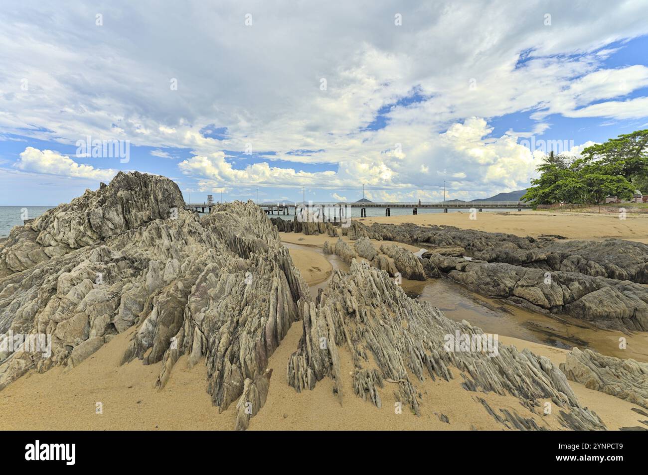 Beach view near Palm Cove Jetty with beautiful rocks formation ...