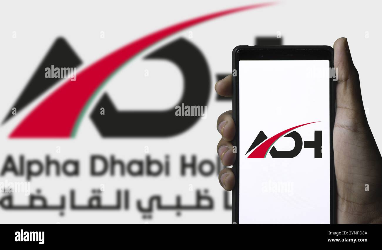Alpha Dhabi Holding (ADH) logo on smartphone Stock Photo - Alamy