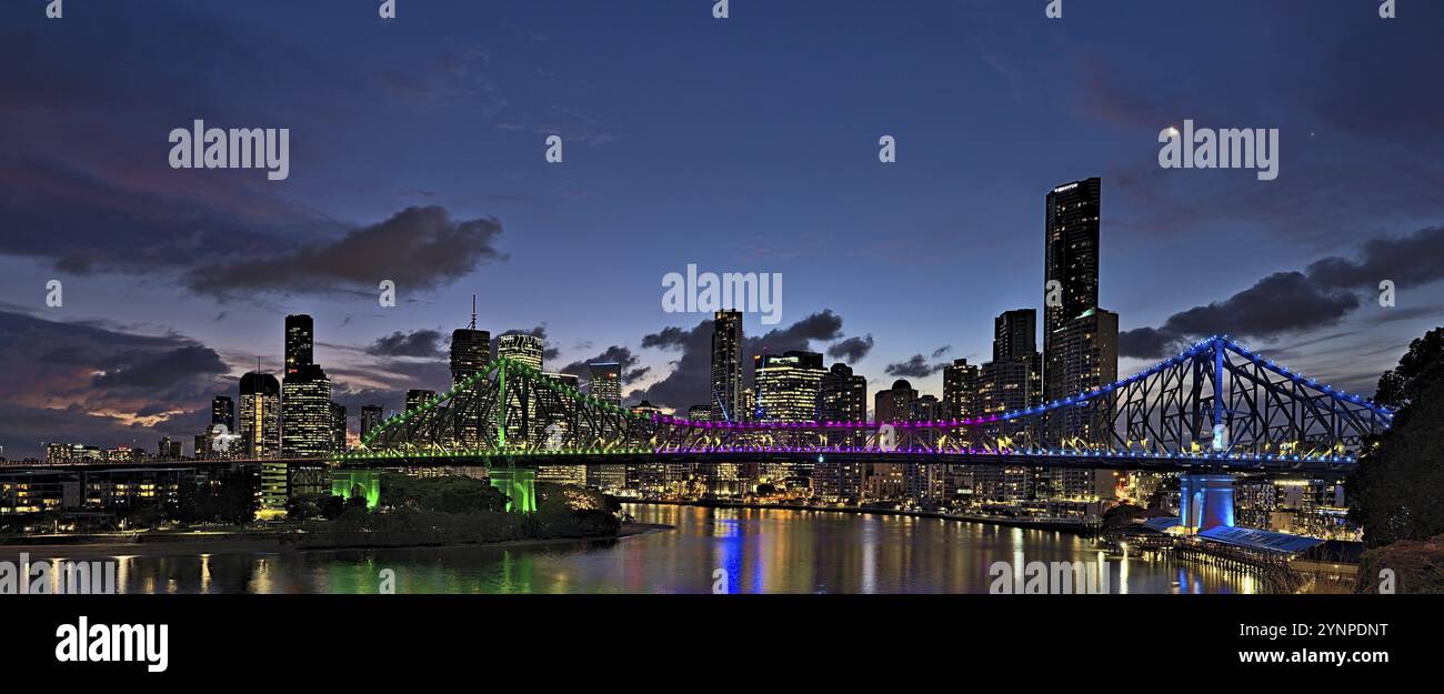 The skyline of Brisbane and the Story Bridge at nighttime Stock Photo ...