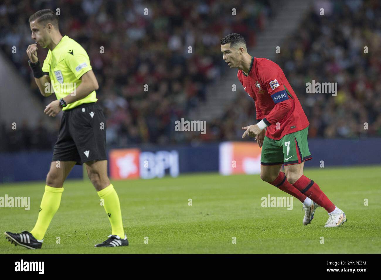 Two players referee run hi-res stock photography and images - Alamy