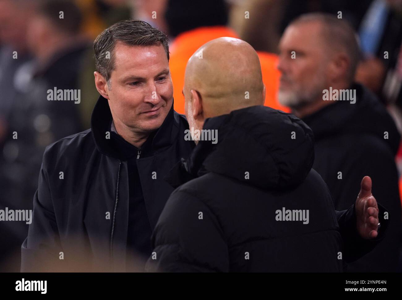 Manchester City manager Pep Guardiola and Feyenoord manager Brian ...