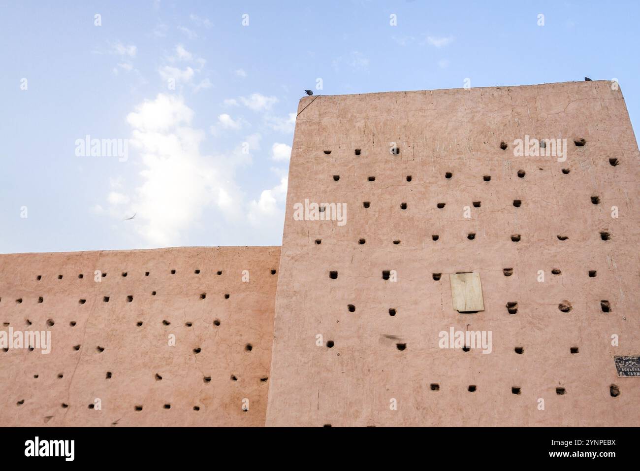 Red city walls of medina at sunset. Marrakech, Marrakech-Safi. Morocco ...