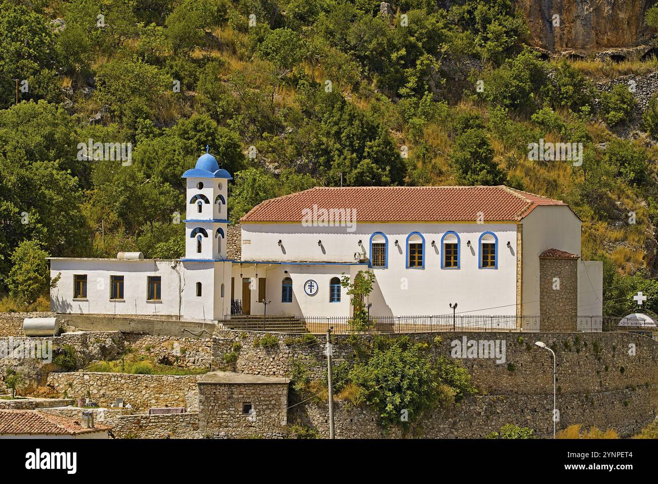 The picturesque greek style village of Dhermi at the coastal road of ...