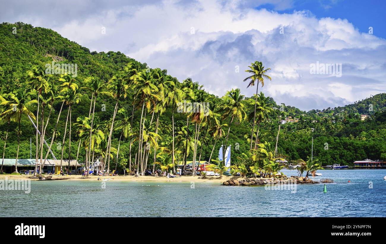 A view of Marigot Bay with palm trees and a gorgeous beach on St. Lucia ...