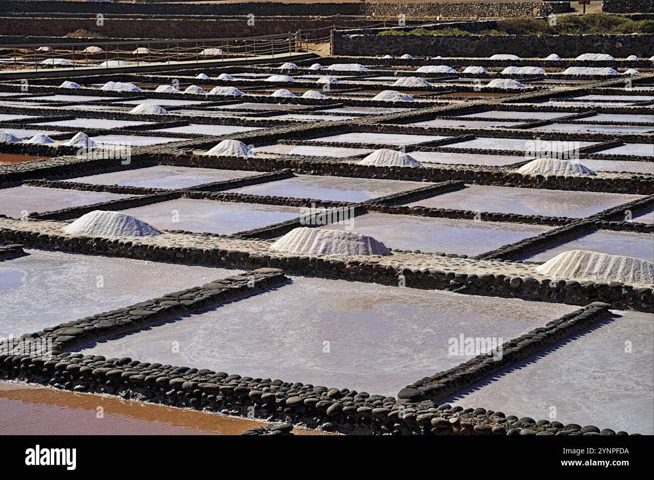 Sea salt. Traditional production from ocean water. Salinas del Carmen ...