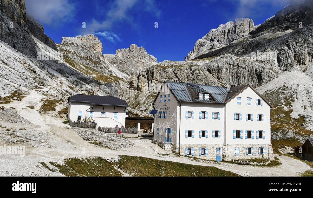 Vajolet Hut (Rifugio Vajolet) below the Vajolet Towers in the Dolomites ...