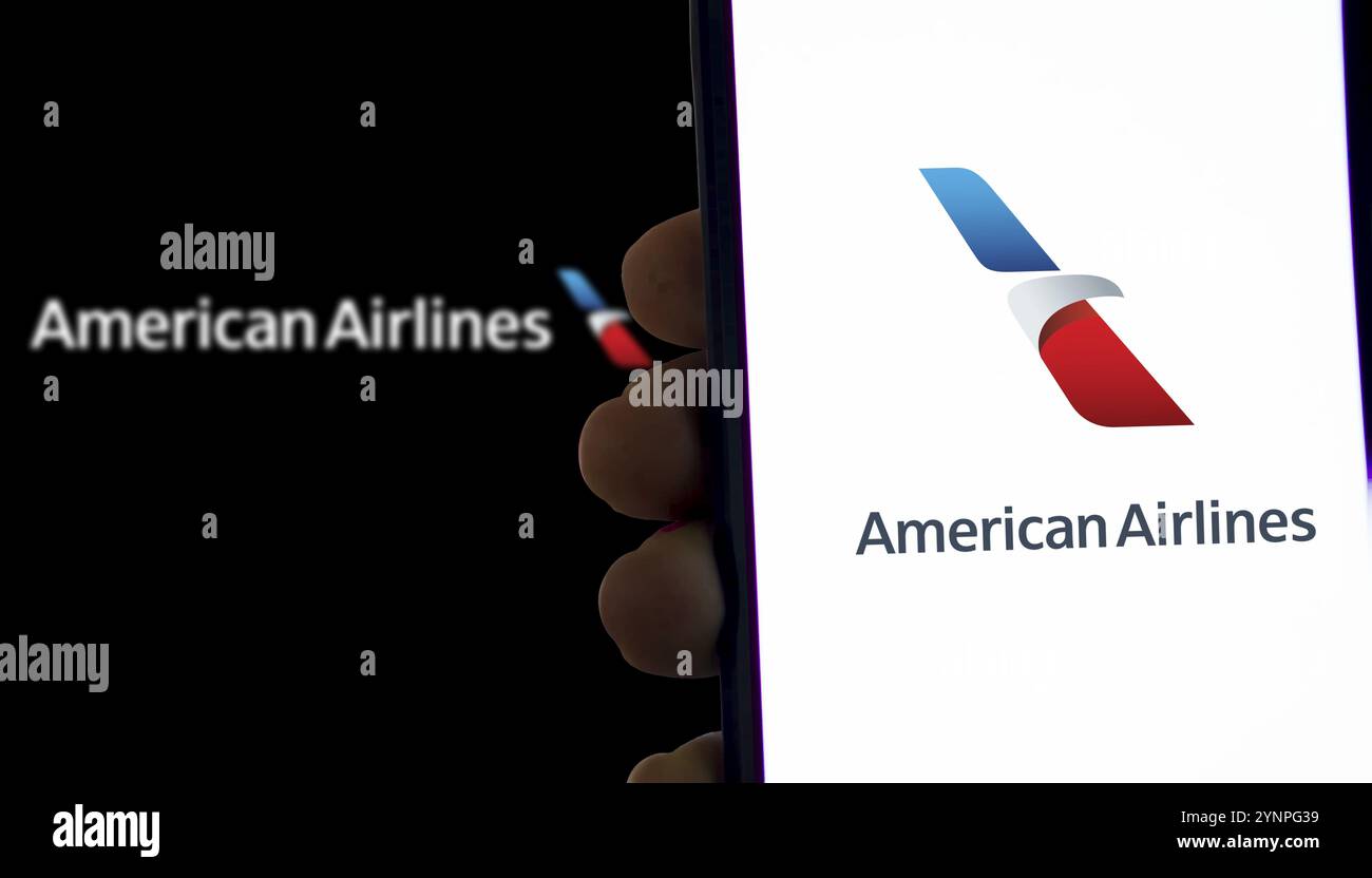 American Airlines logo is displayed on a smartphone screen Stock Photo ...