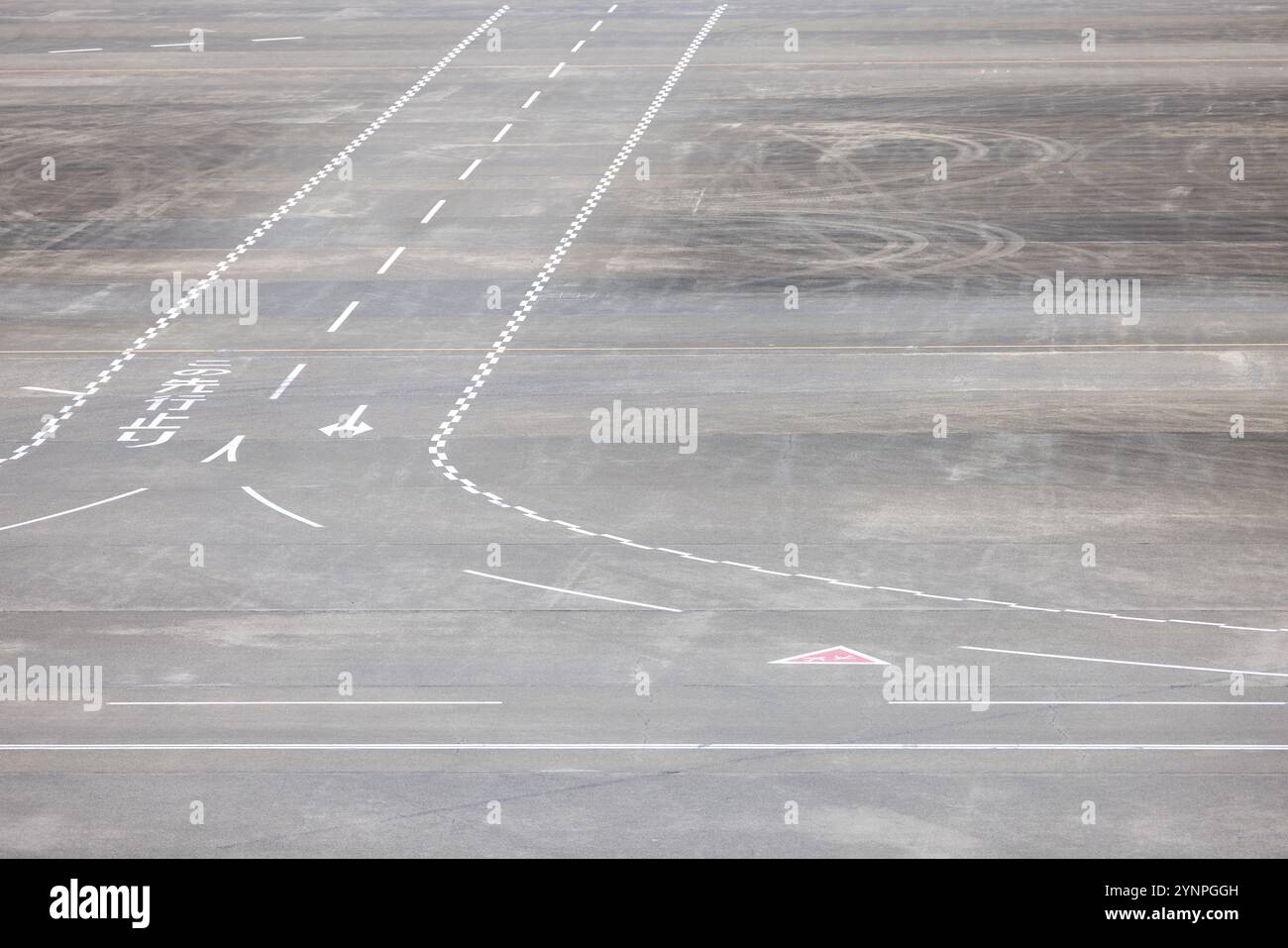 Airport tarmac with directional markings Stock Photo - Alamy