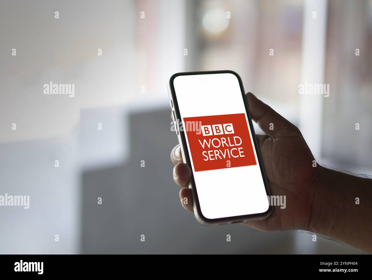 BBC News logo on smartphone screen with breaking news background Stock ...