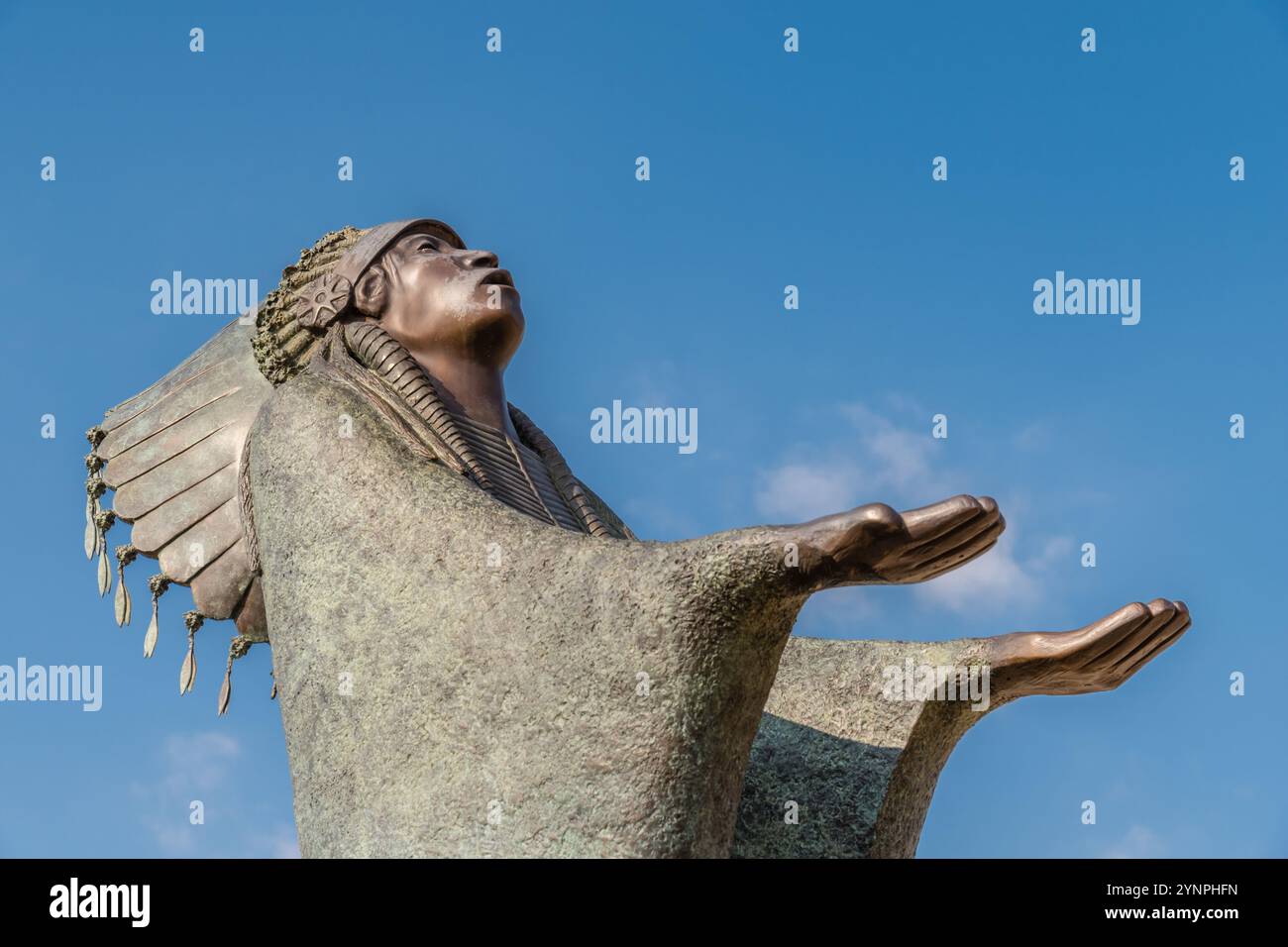Albuquerque, NM, US-December 7, 2022: Sculpture of an indigenous native ...