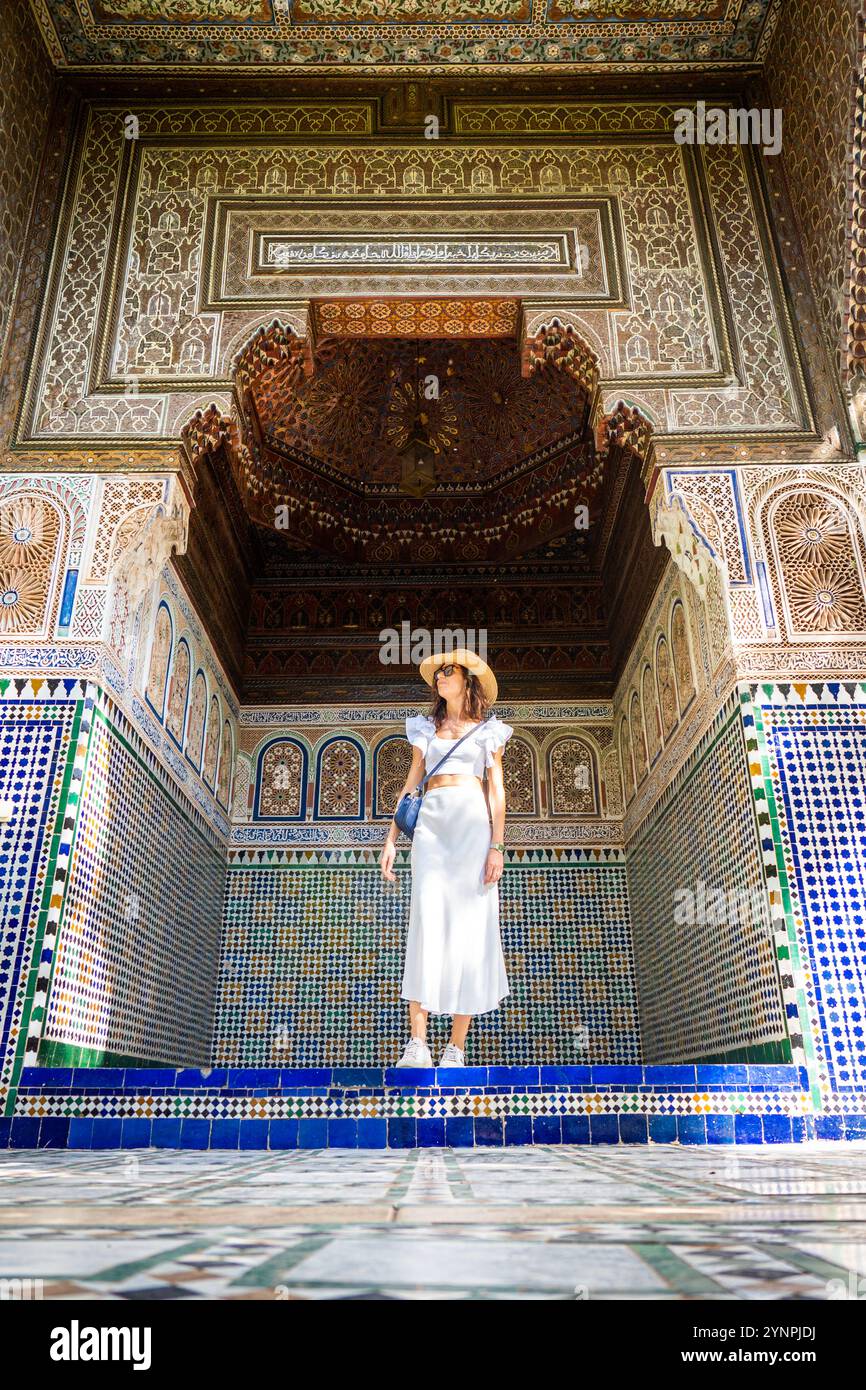 Young Dark Haired Woman in Hat White Shirt and Skirt Posing in the ...