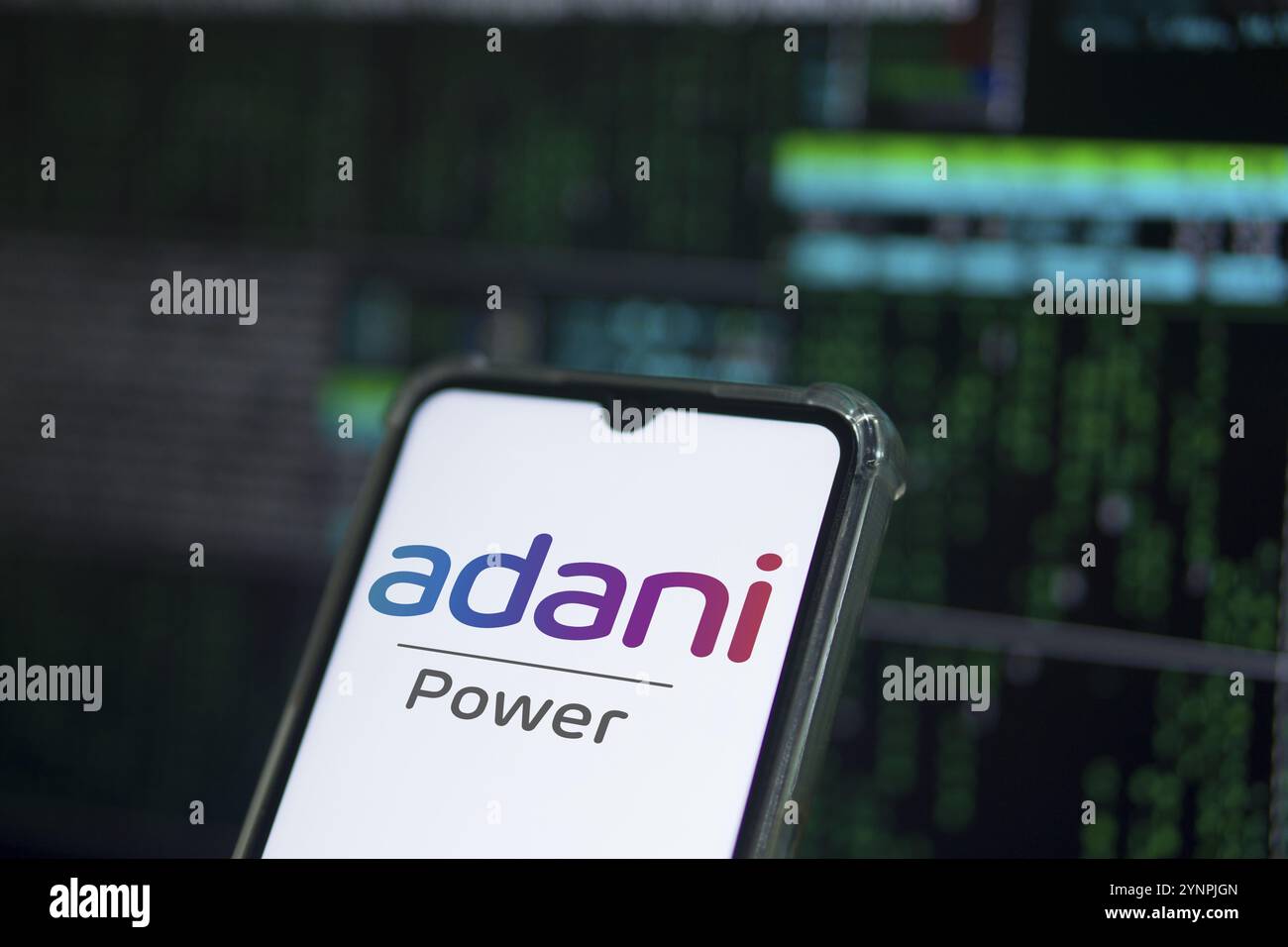 Adani Green Energy Limited on screen in front of business logo Stock ...