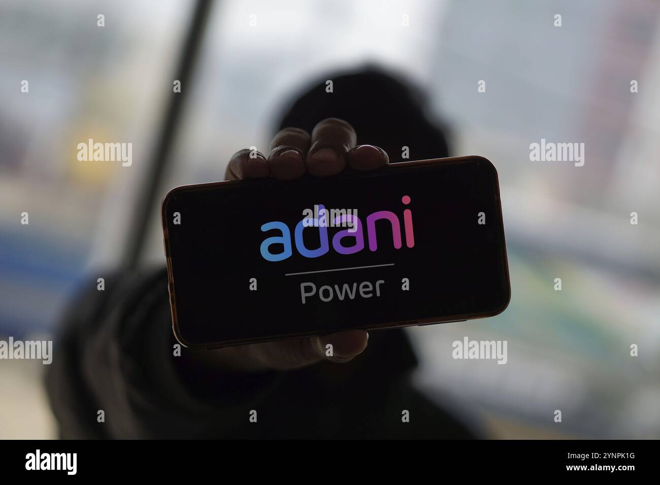 Adani Green Energy Limited on screen in front of business logo Stock ...