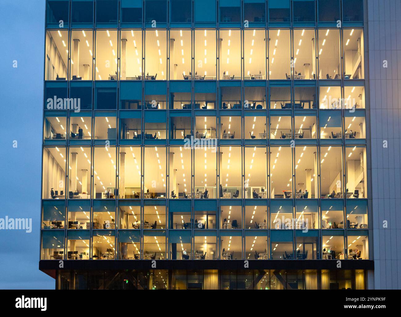 Office with people behind their computer desks Stock Photo - Alamy