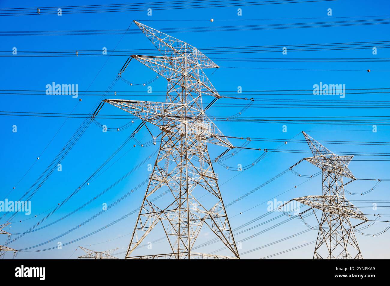 metal supports of high-voltage power transmission wires Stock Photo - Alamy