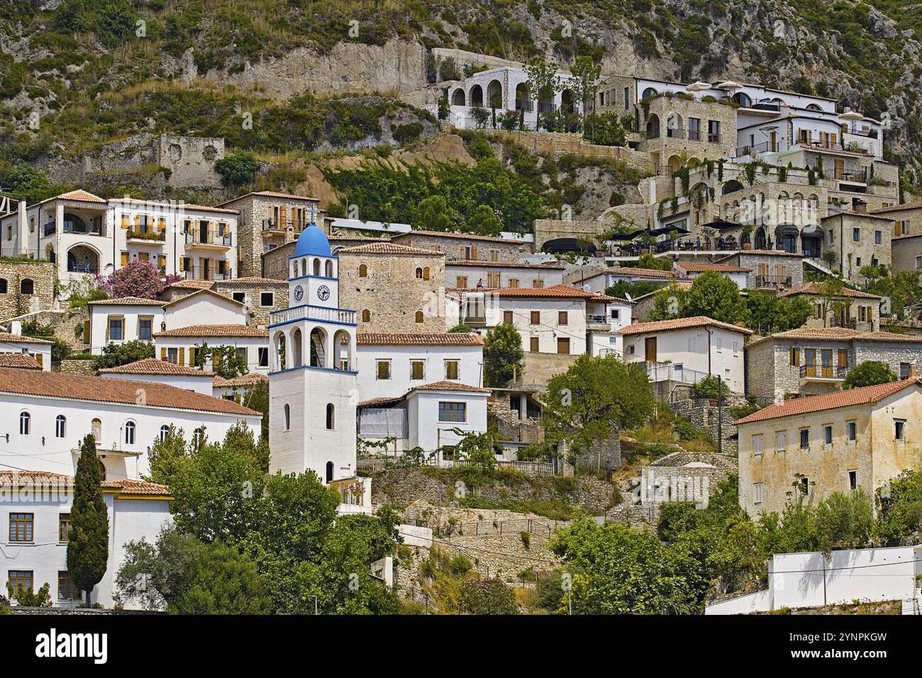 The picturesque greek style village of Dhermi at the coastal road of ...