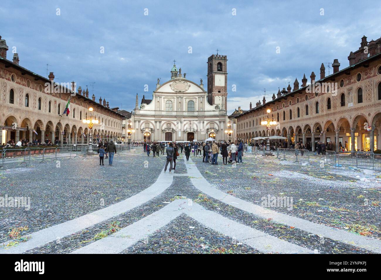 Confetti-strewn square in front of an ornate historical building ...
