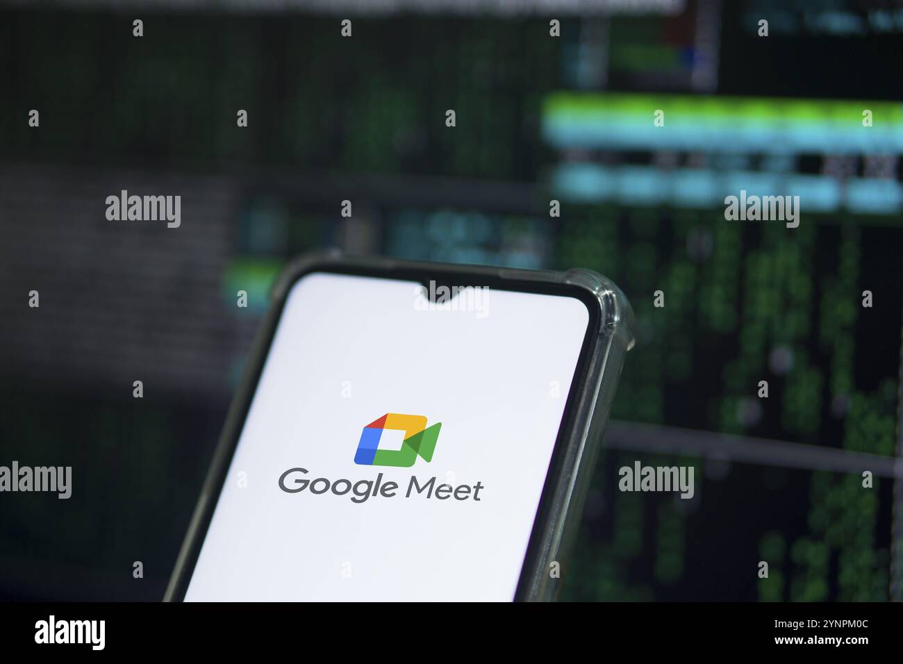 Google Meet app on smartphone screen. On a blue background, Google Meet ...