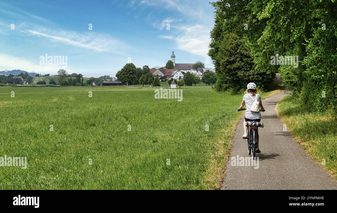 Cyclist on the Federsee lake circular route Stock Photo - Alamy