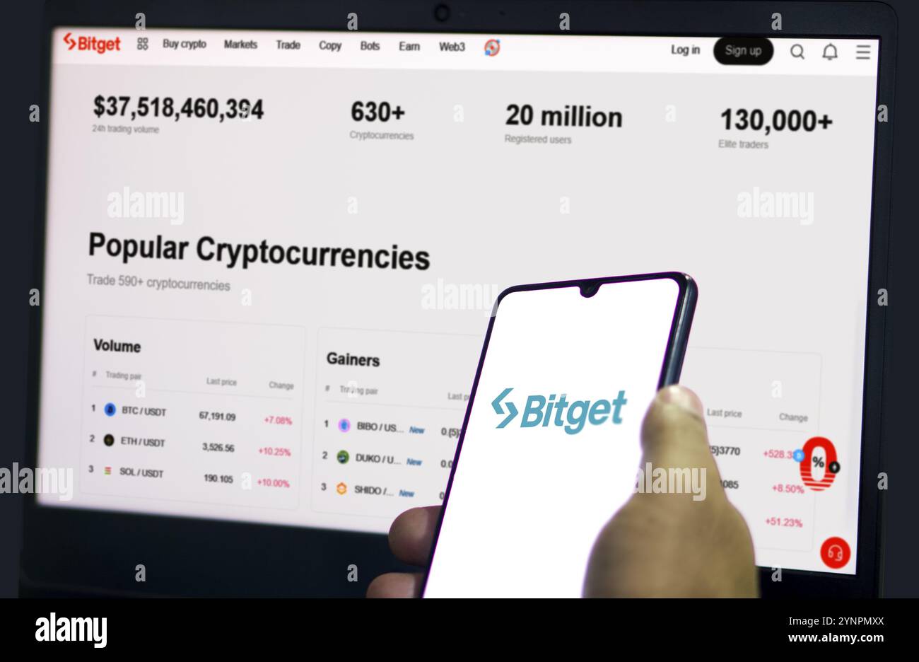 In this photo illustration, the Bitget logo is seen displayed on a ...