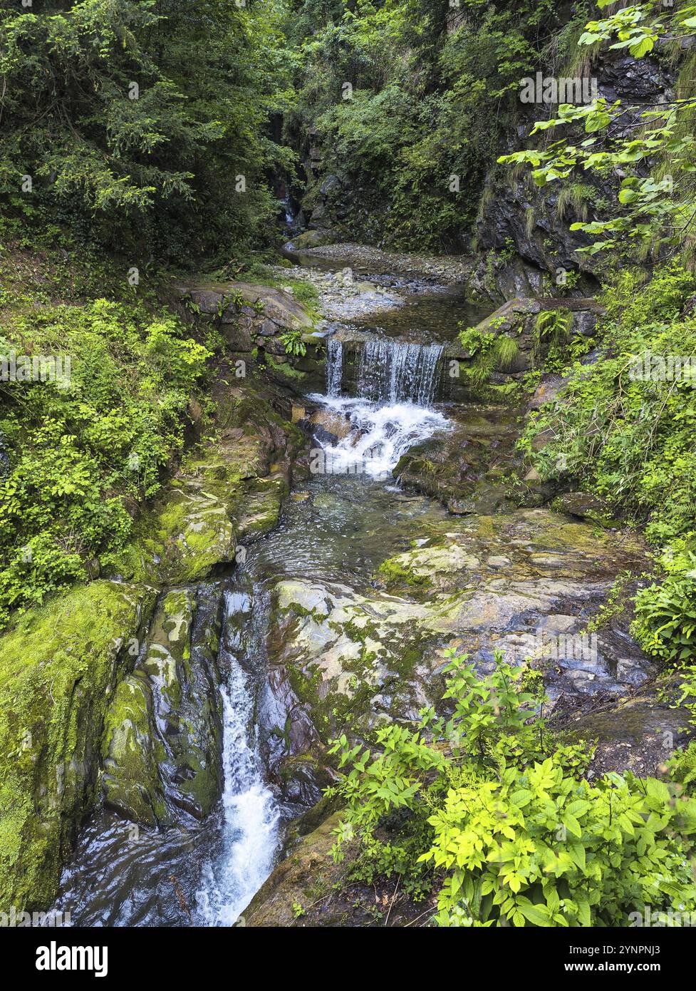 A view of a waterfall near Varenna on Lake Como in Italy Stock Photo ...