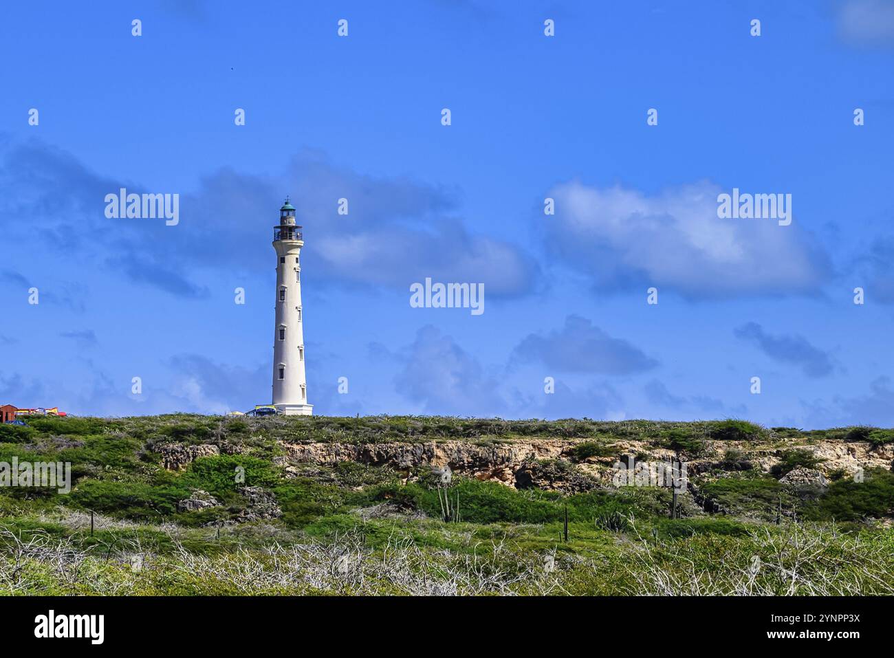 The California Lighthouse on the Caribbean island of Aruba under a blue ...