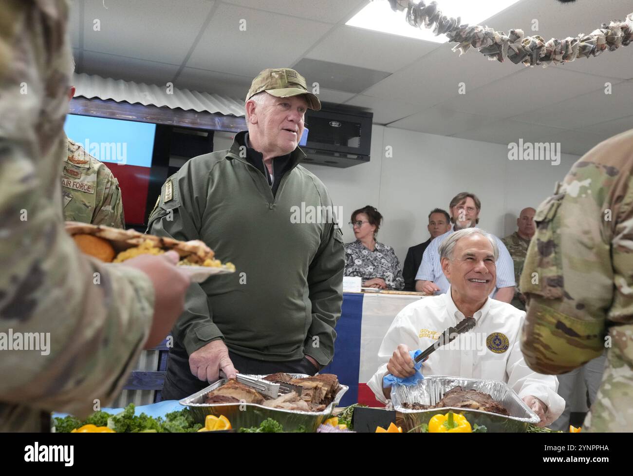 Newly appointed "border czar" TOM HOMAN helps Texas Gov. GREG ABBOTT at ...