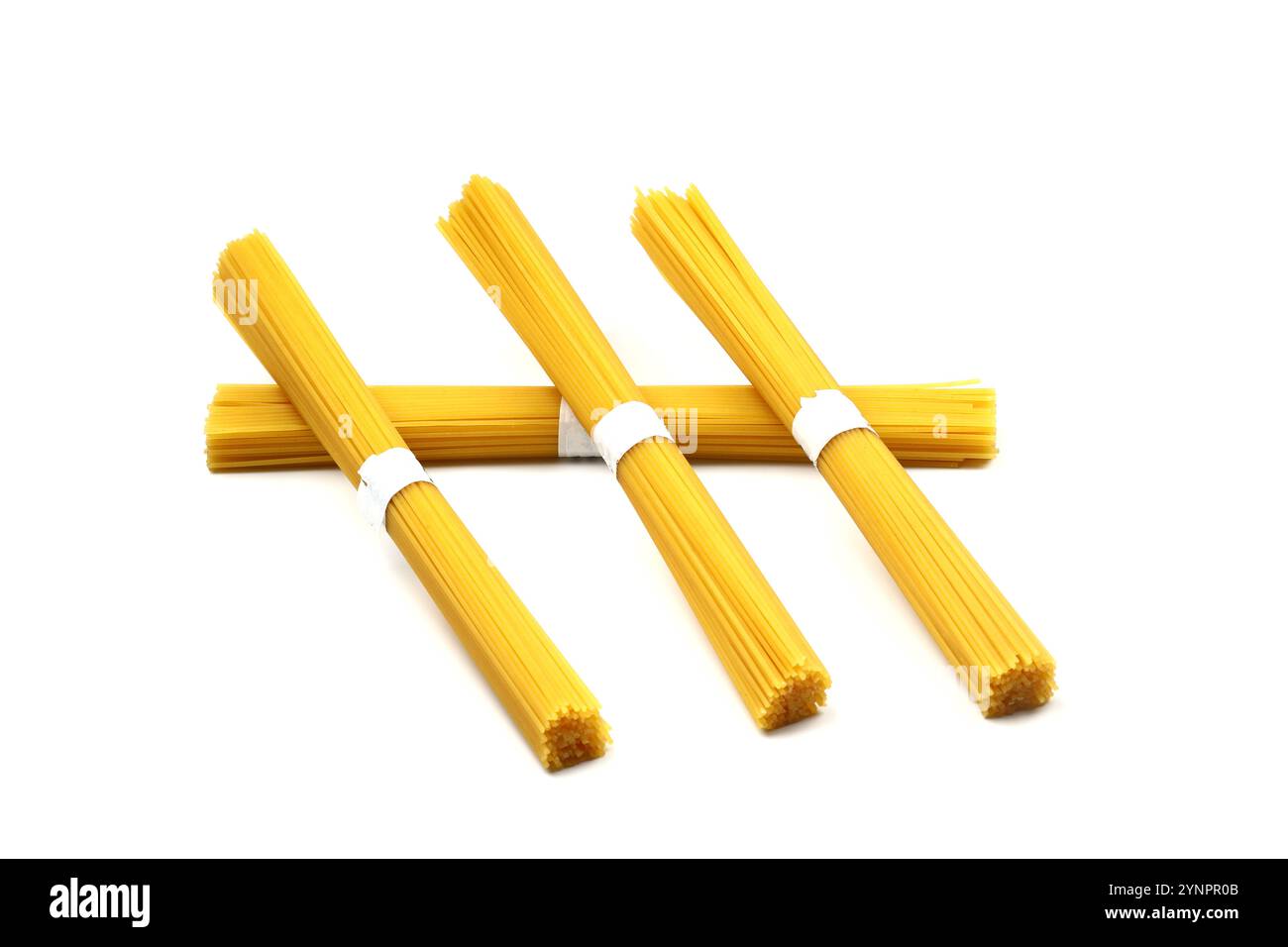 pile of spaghetti on white background, top view Stock Photo - Alamy