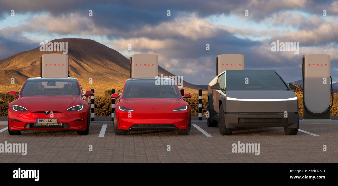 Tesla electric car models at charging station Stock Photo - Alamy