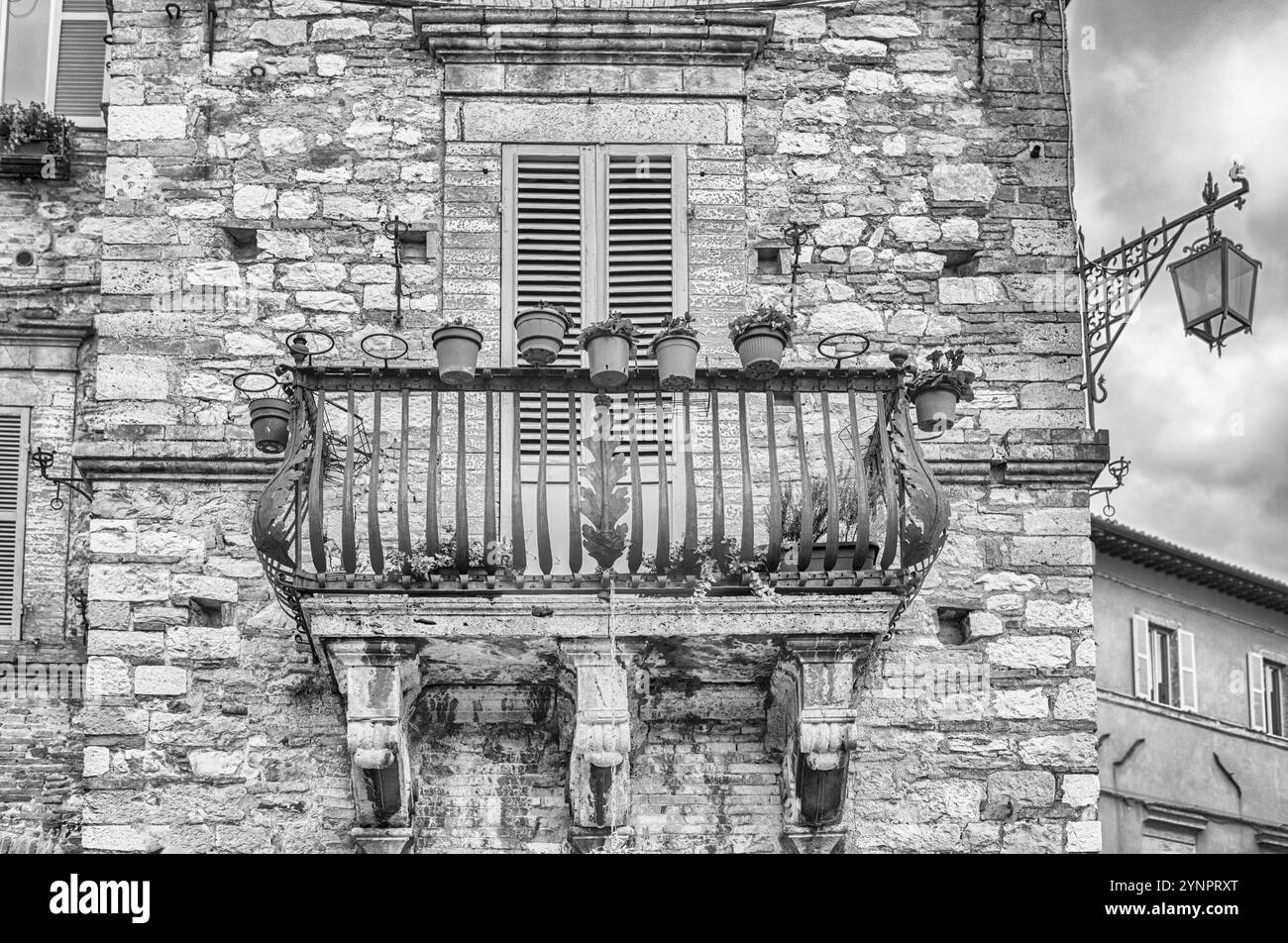 Historical buildings in the old city center of Assisi, one of the most ...