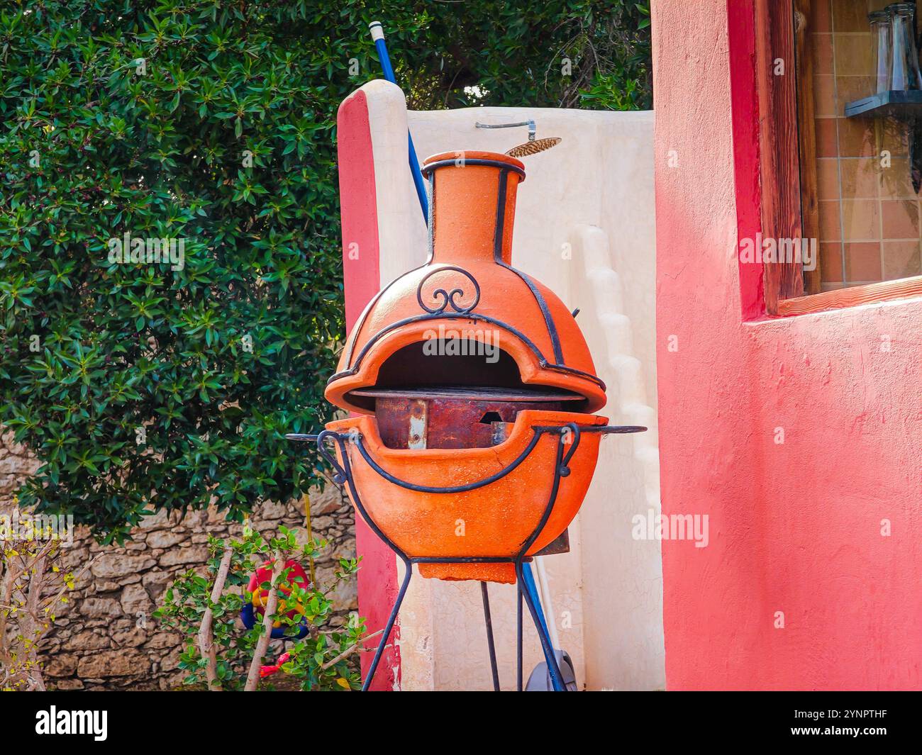 Traditional Moroccan Berber barbecue clay grill stove standing outdoors ...