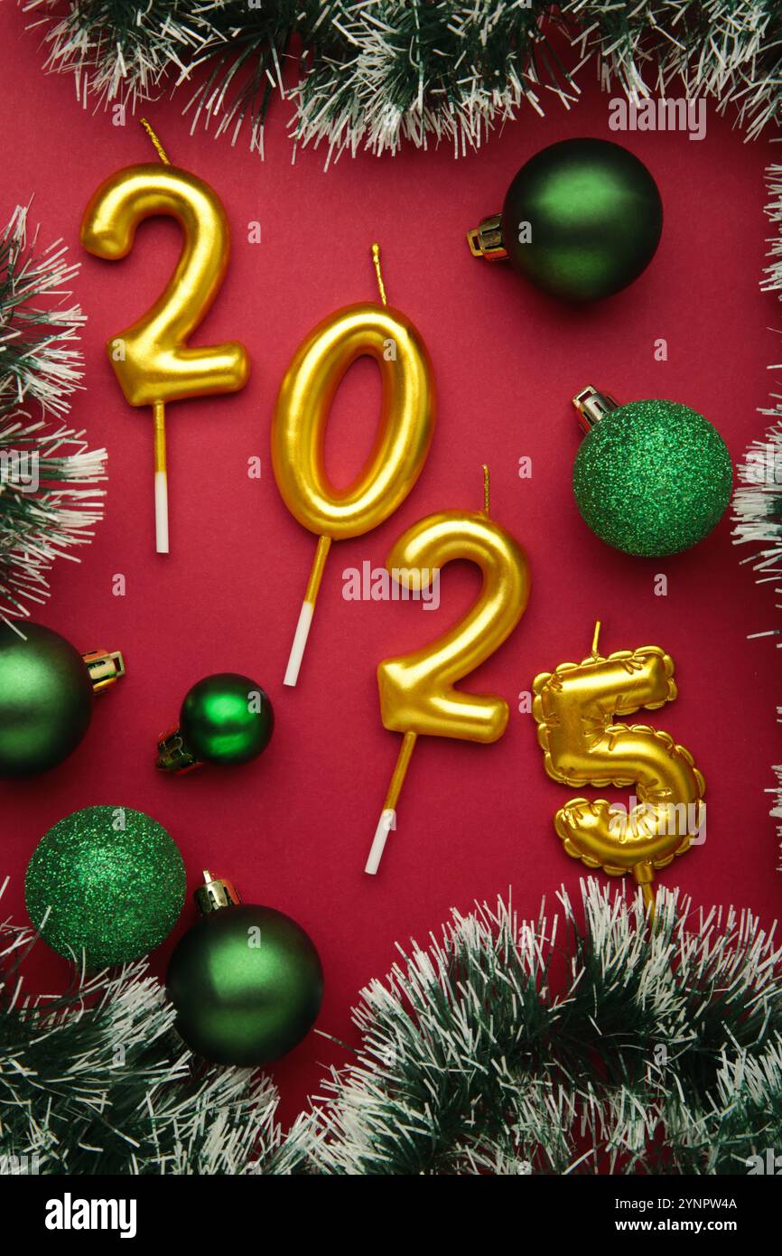Merry Christmas and Happy New Year 2025. Golden candles numbers 2025 ...