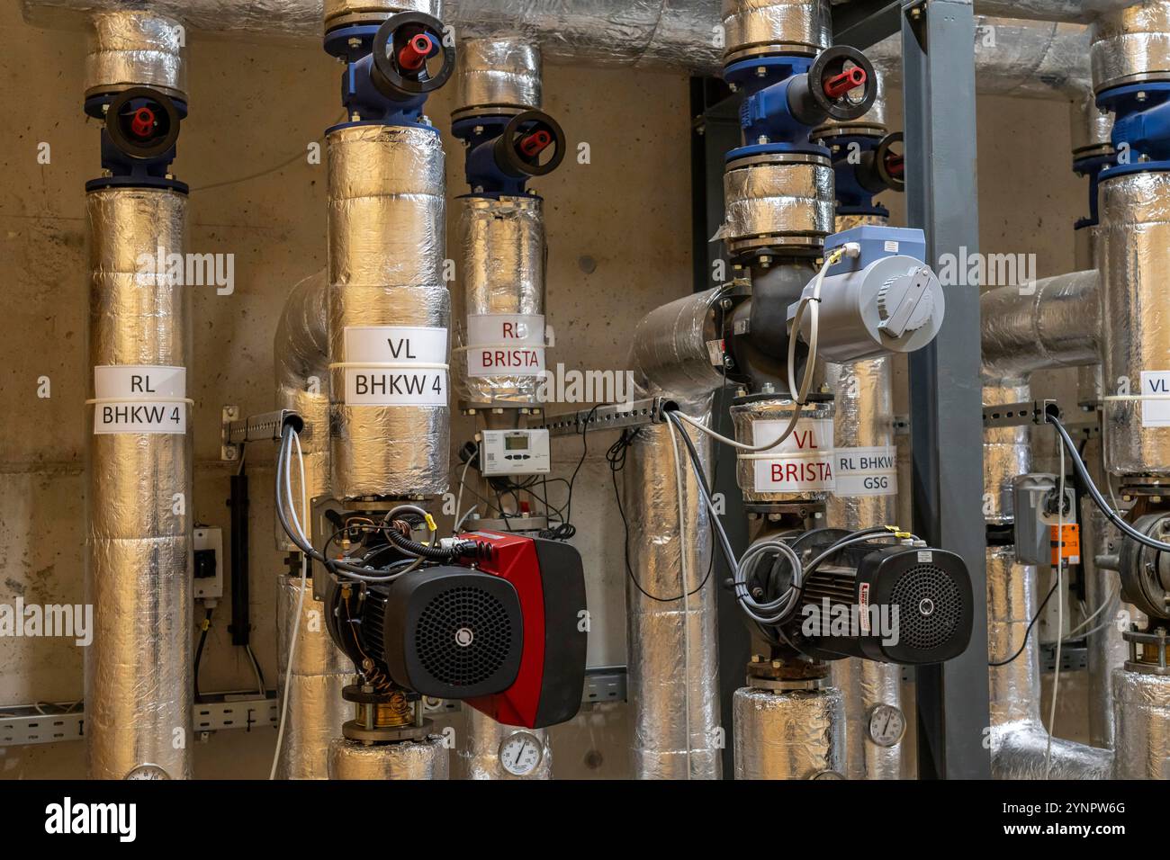 Pipes, control elements of the heat storage tank of a biogas plant ...