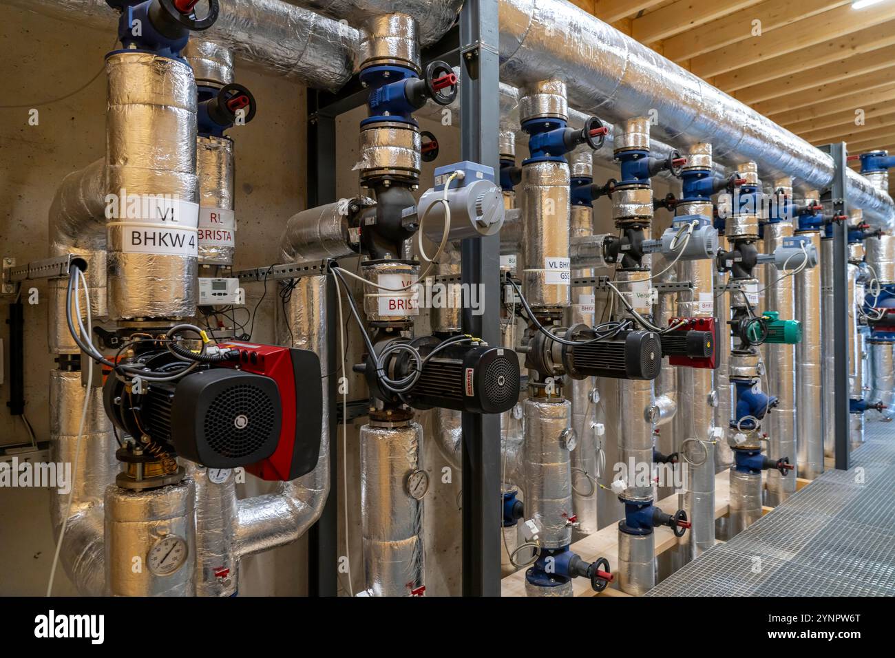Pipes, control elements of the heat storage tank of a biogas plant ...