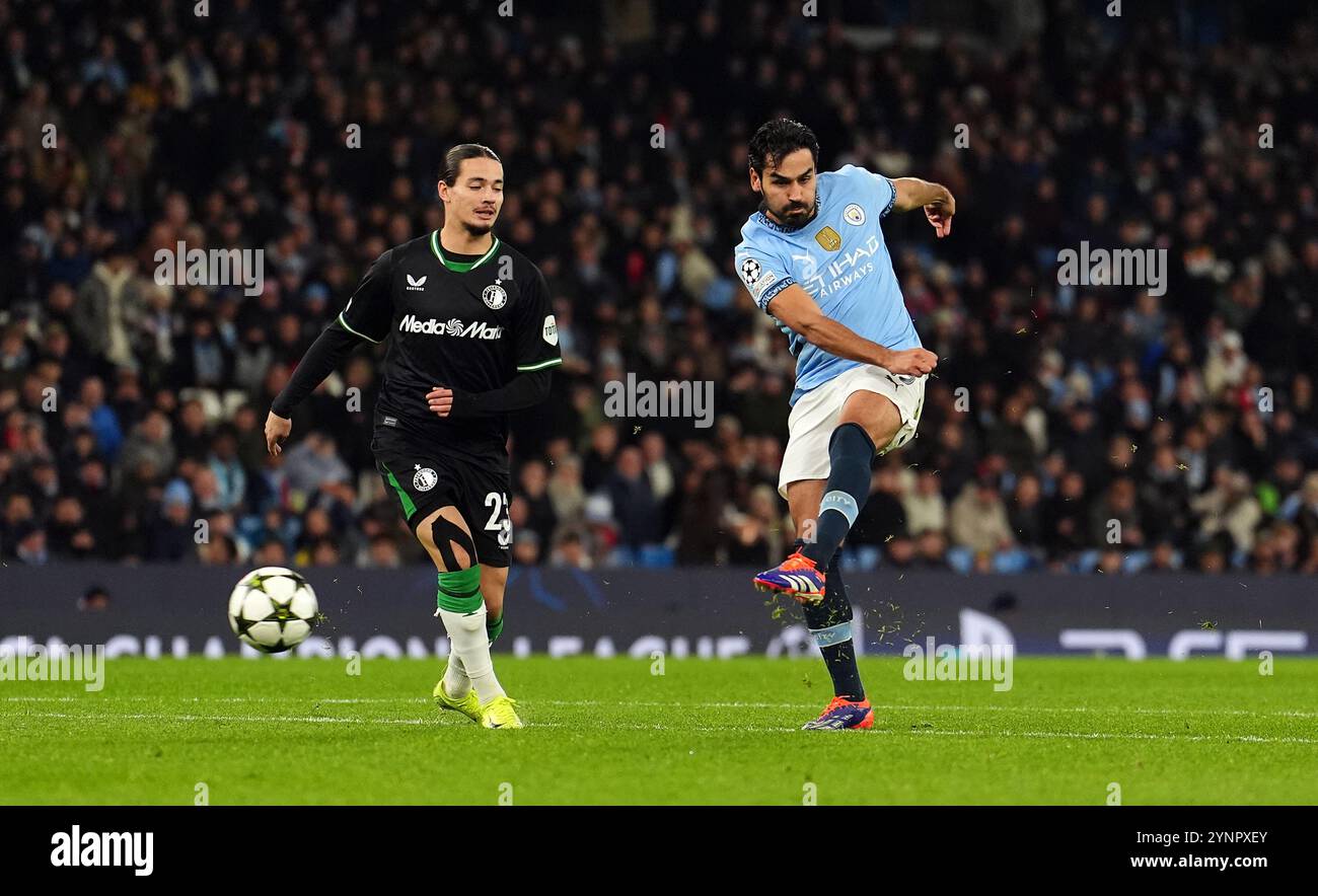 Manchester City's Ilkay Gundogan scores their side's second goal of the ...