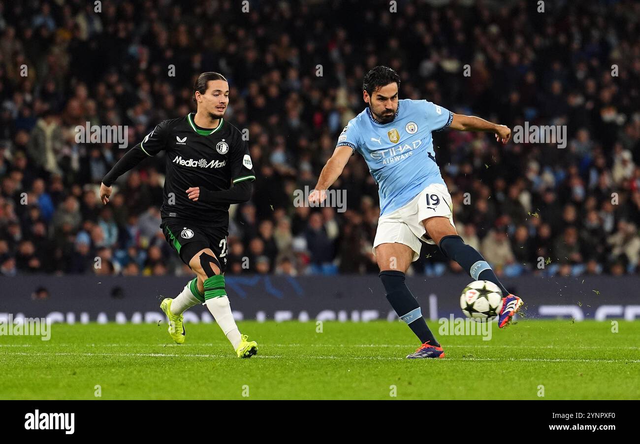 Manchester City's Ilkay Gundogan scores their side's second goal of the ...