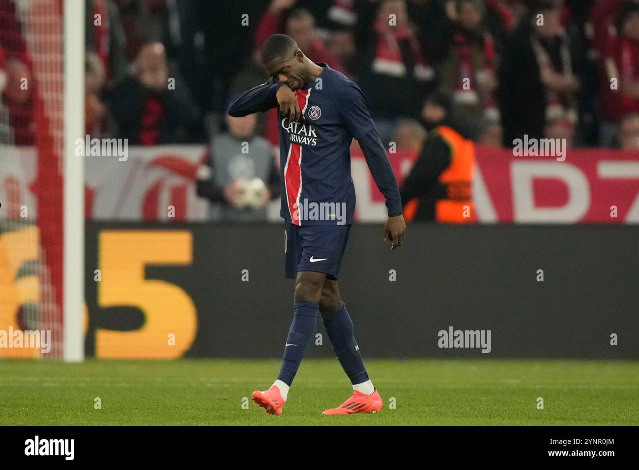 PSG's Ousmane Dembele leaves the pitch after being shown a red card ...