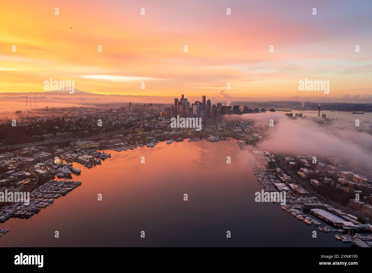 Clouds Above Seattle and Mount Rainier at Sunrise Aerial Stock Photo ...