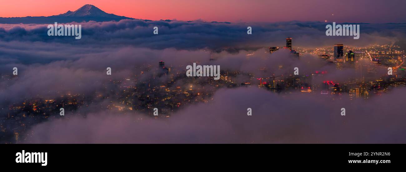 Seattle and Mount Rainier in the Clouds at Sunrise Aerial Stock Photo ...