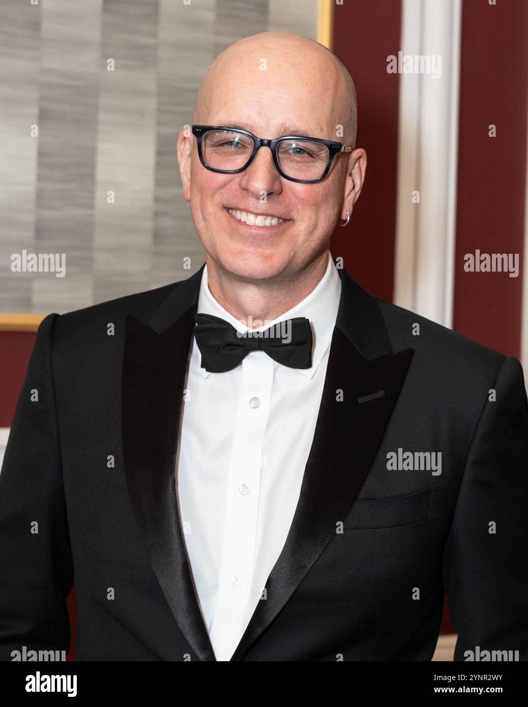 Kelly AuCoin poses in press room during International Emmy Awards at ...