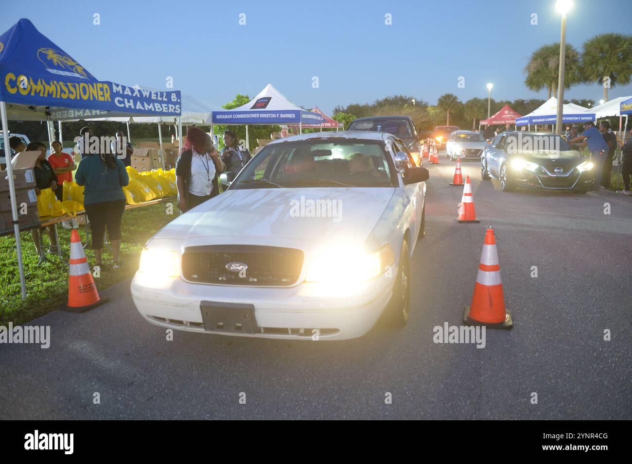 MIRAMAR, FLORIDA -NOVEMBER 25: Cars line up as city of Miramar employee ...