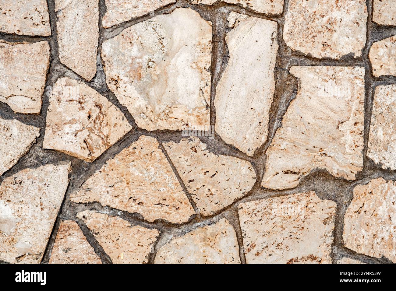 wall is lined with granite flat stones Stock Photo - Alamy
