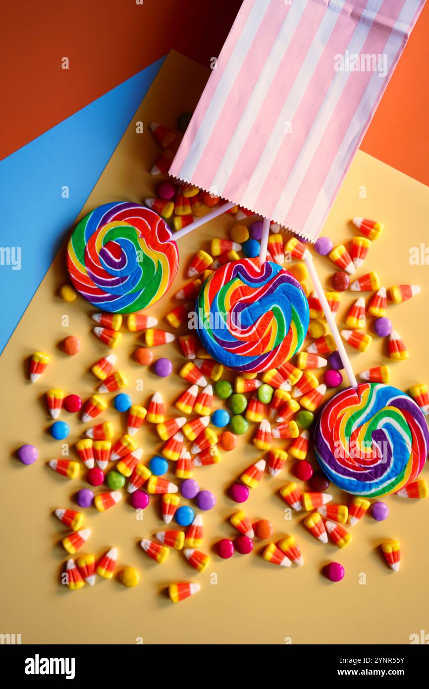 Lollipops and candy with modern color blocking aesthetic Stock Photo ...