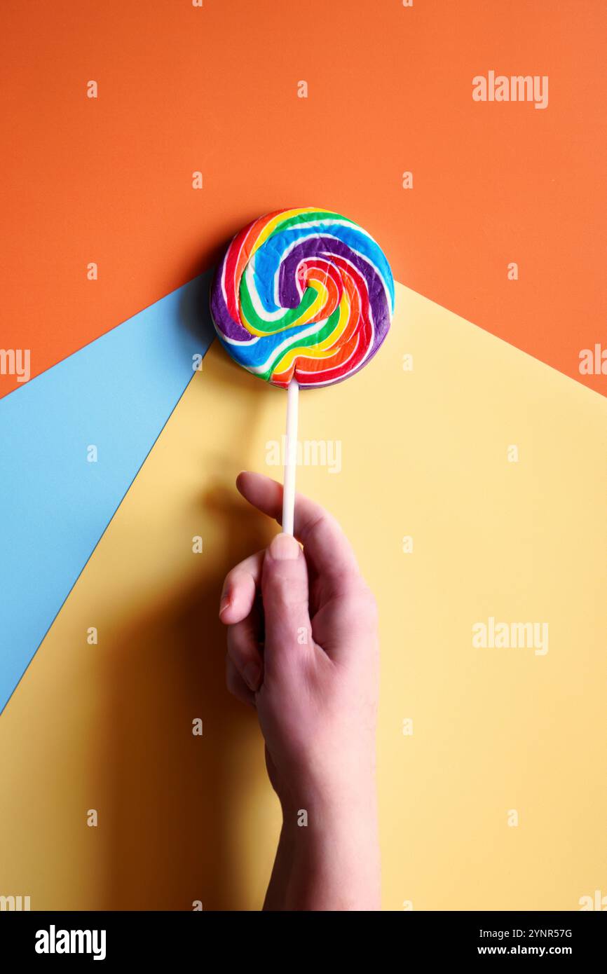 Lollipop with modern color blocking aesthetic Stock Photo - Alamy